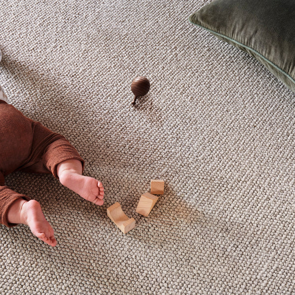 vacuuming wool loop carpet
